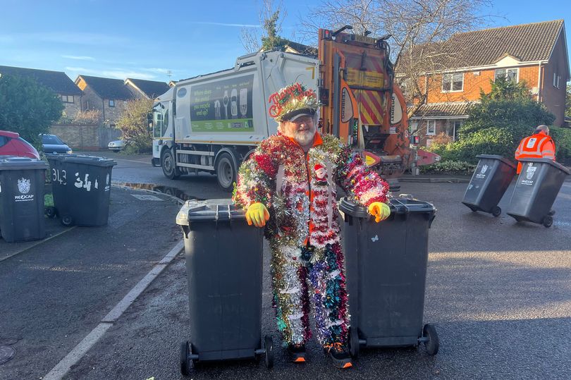 'Walking Christmas tree' bin man dresses up to 'spread joy' in city