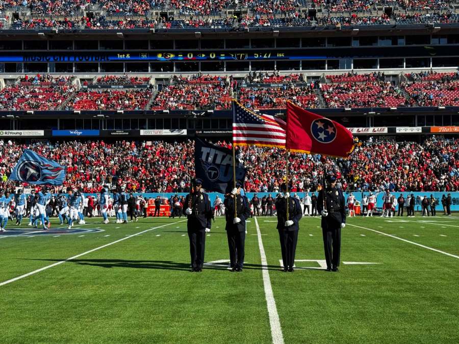 Collierville PD honor guard presents colors at Titans game