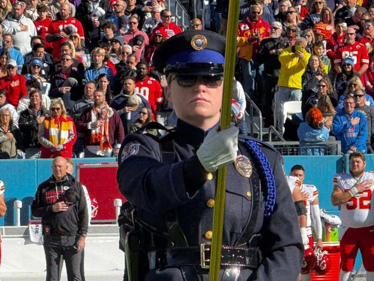 Collierville PD honor guard presents colors at Titans game