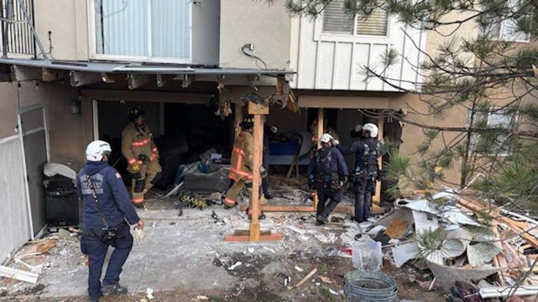 Driver hospitalized, child injured after vehicle crashes into building ...