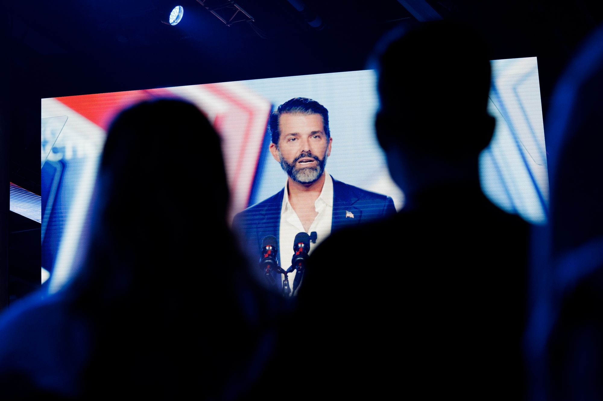 Trump threatens to 'fire' Don Jr at fractious Turning Point conference