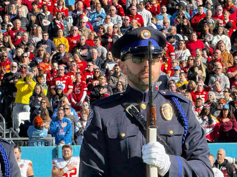 Collierville PD honor guard presents colors at Titans game