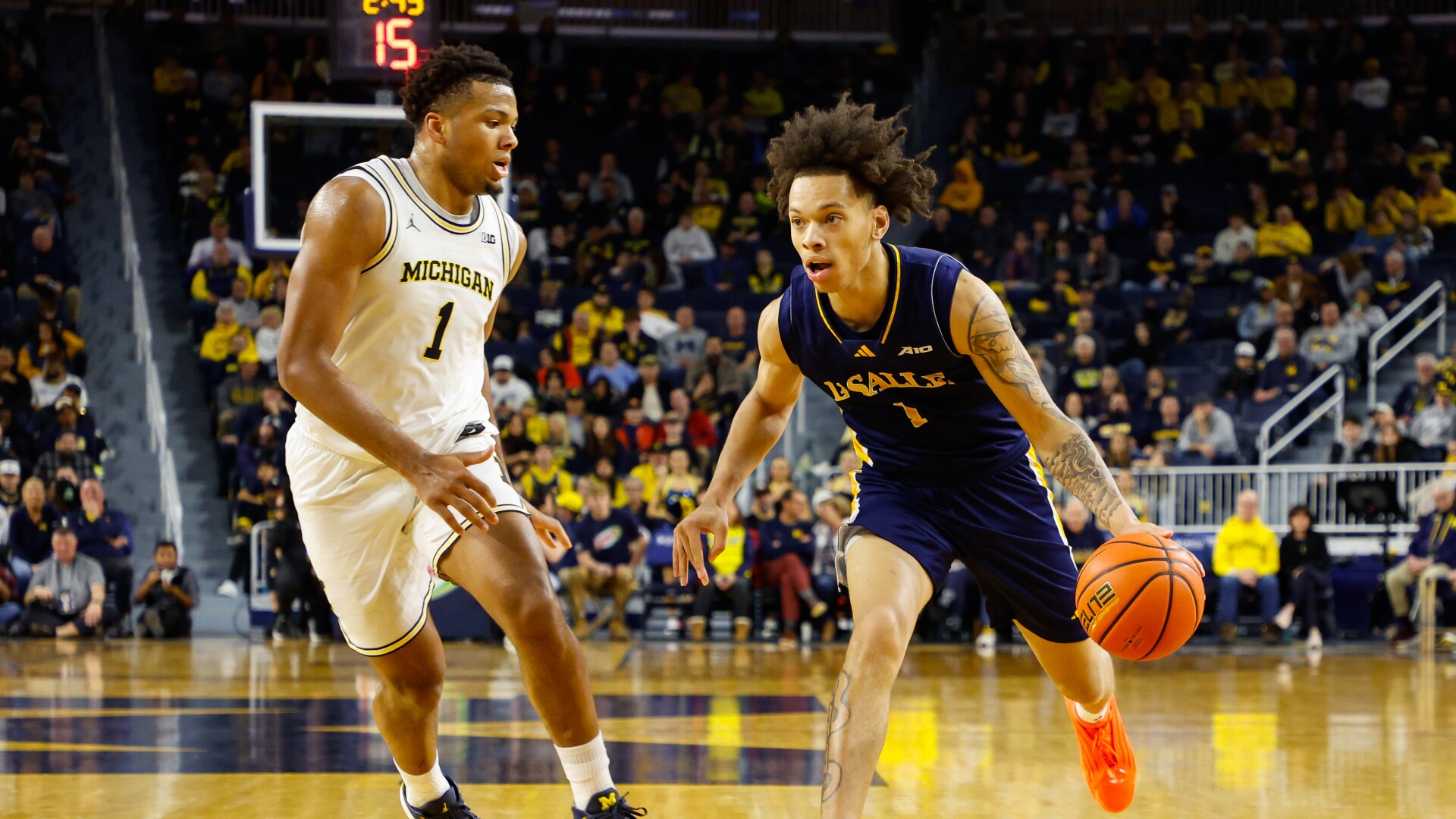 Trey McKenney scores 17 points as No. 2 Michigan pounds La Salle 102-50