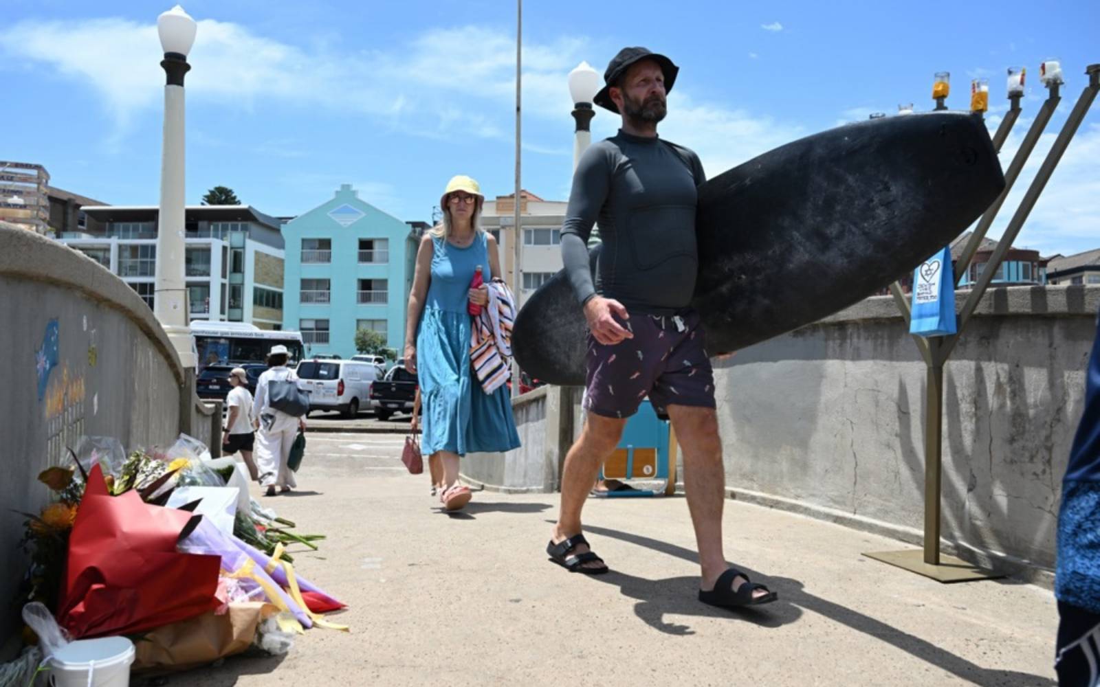 Australian state pushes tough gun laws, 'terror symbols' ban after shooting