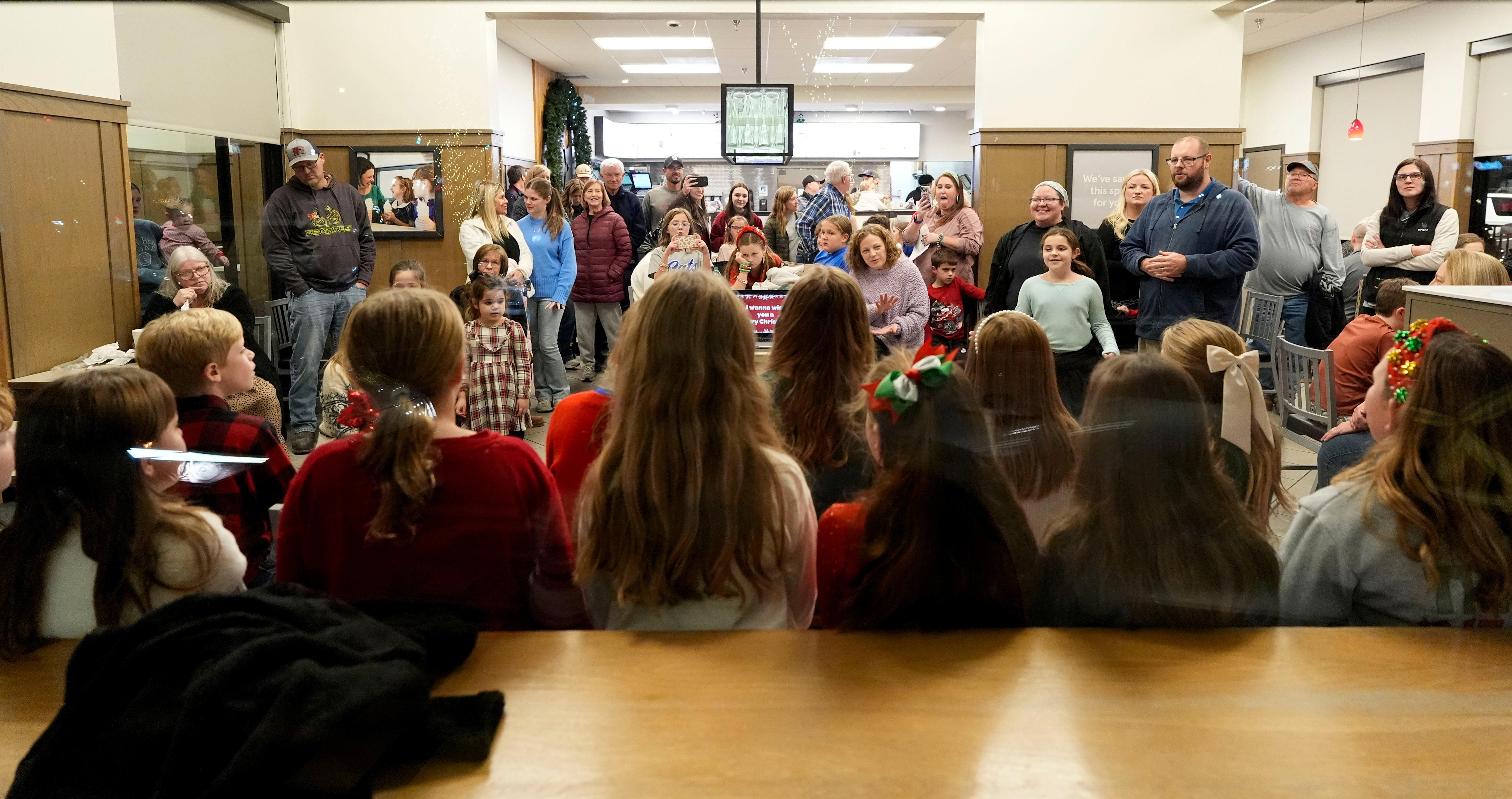 Huntington Place students sing Christmas carols at Chick-fil-A
