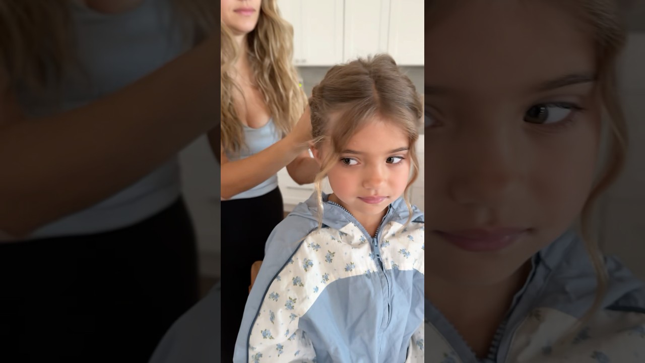 Mom demonstrates an elegant but simple claw clip hairstyle for kids