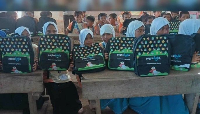 675 marginalized Moro school children receive bags and rice rations