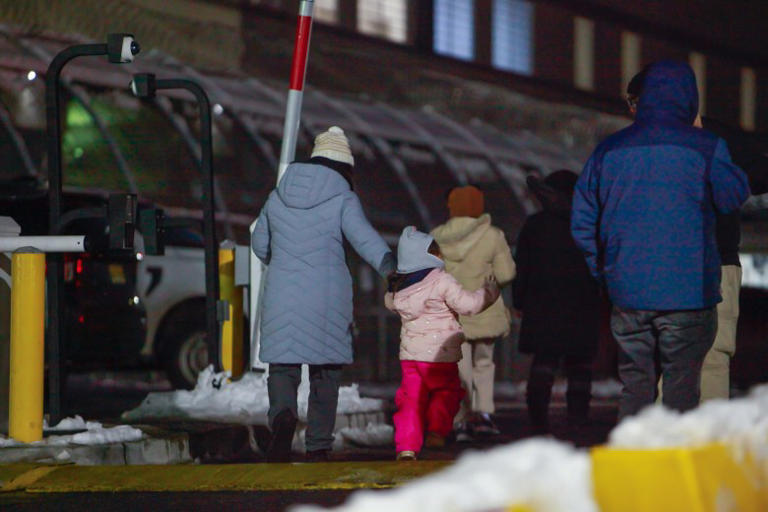 In freezing cold and long lines, families wait to see detained migrants ...