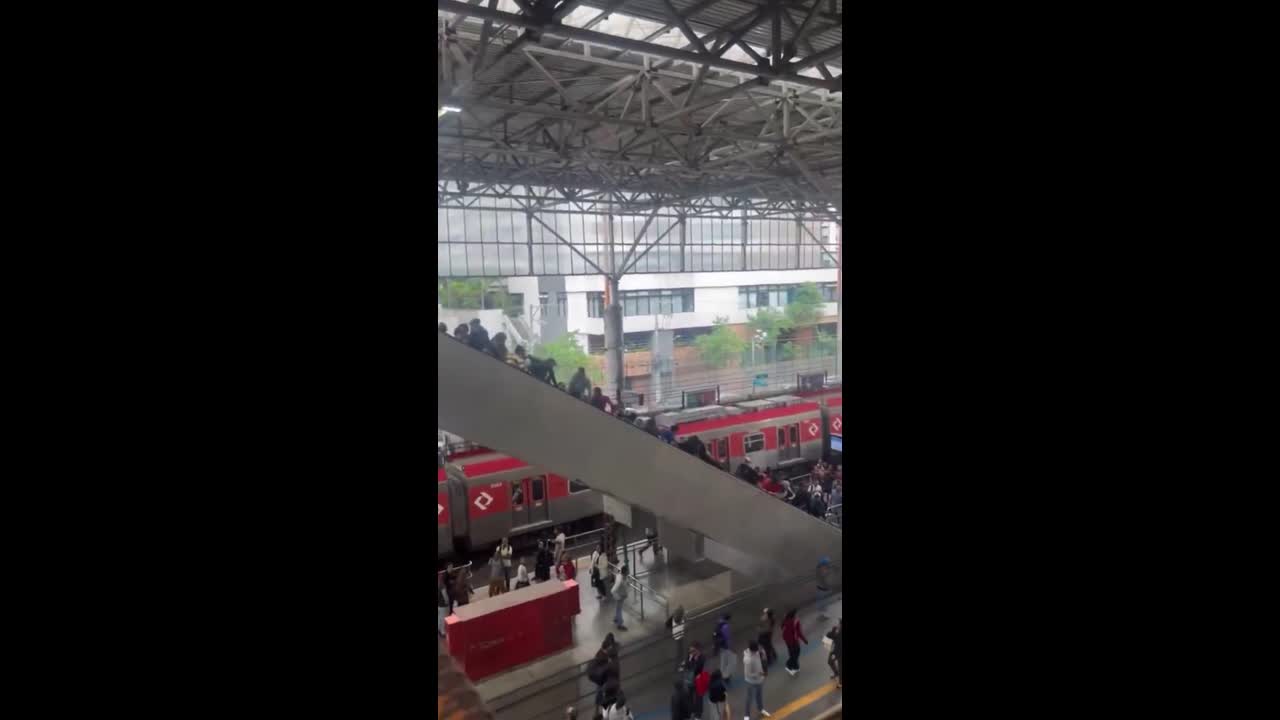 Escalator pile-up leaves 13 injured at train station in Brazil