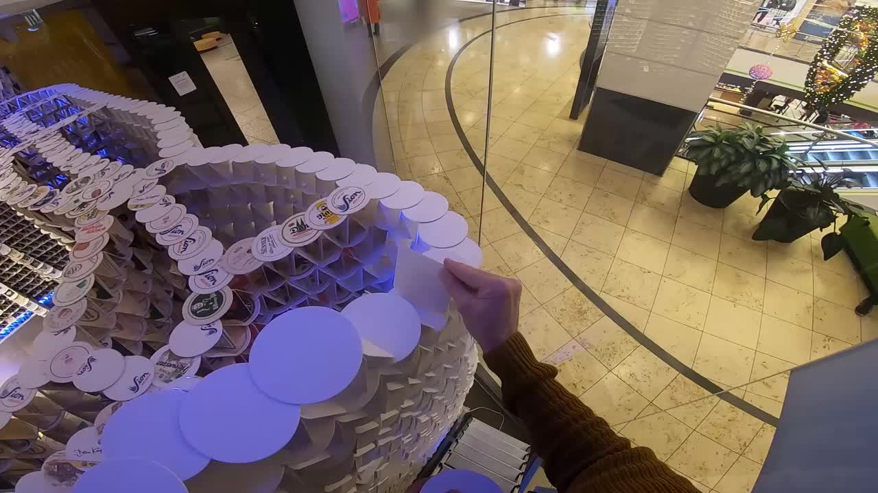 Devastating moment man's structure of 64,000 beer mats collapses in ...