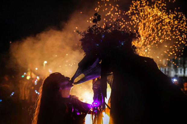 Thousands ‘turn world upside down’ celebrating midwinter solstice at ...