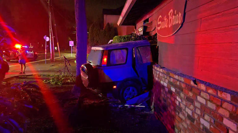 Car crashes into Gresham apartment complex, displacing family