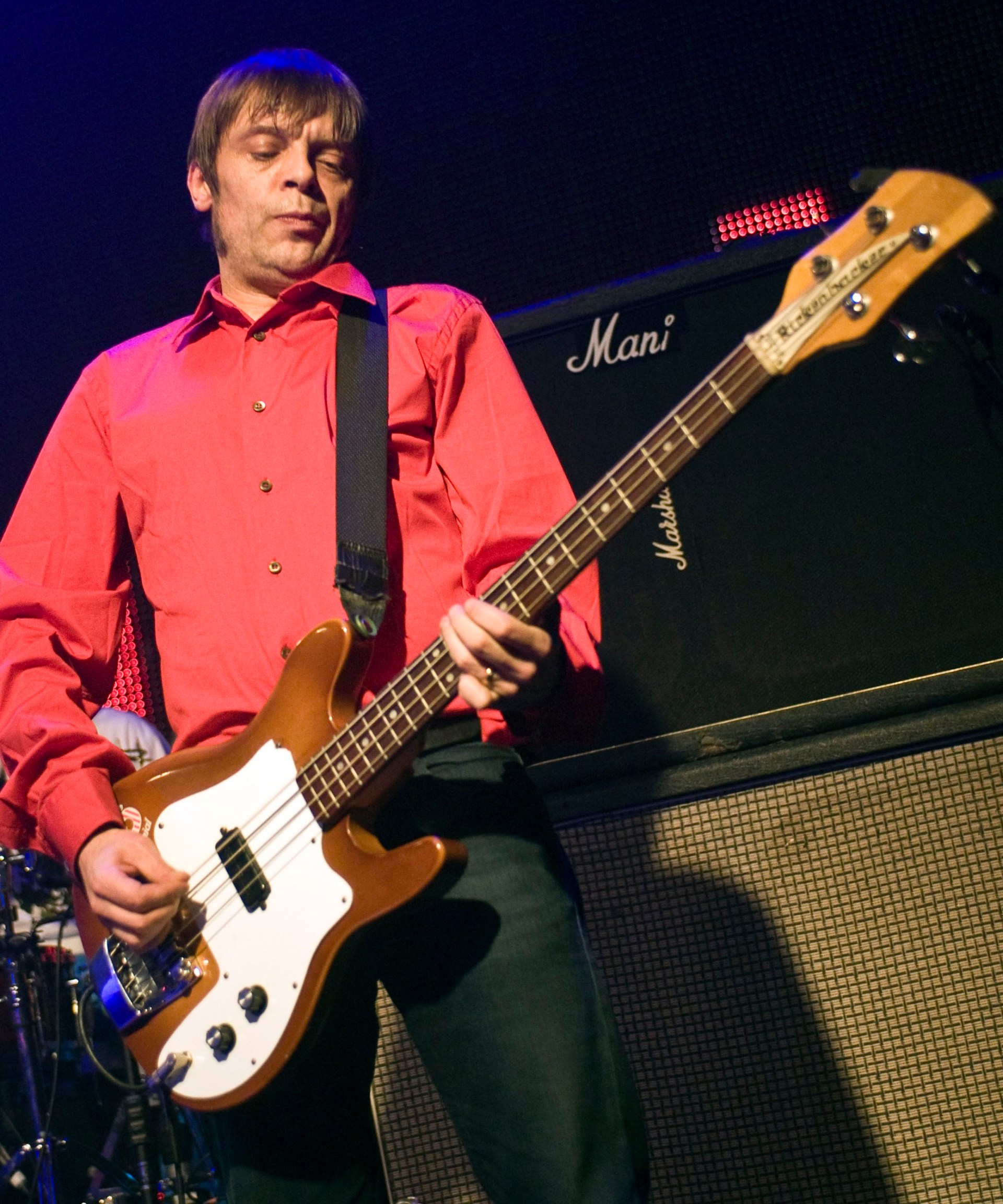 Liam Gallagher carries Gary Mounfield's coffin