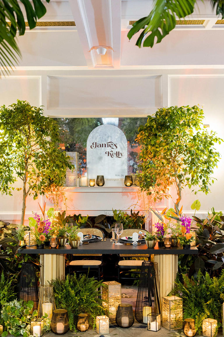 These dapper grooms wore burgundy tuxedos to their “tropical disco” wedding