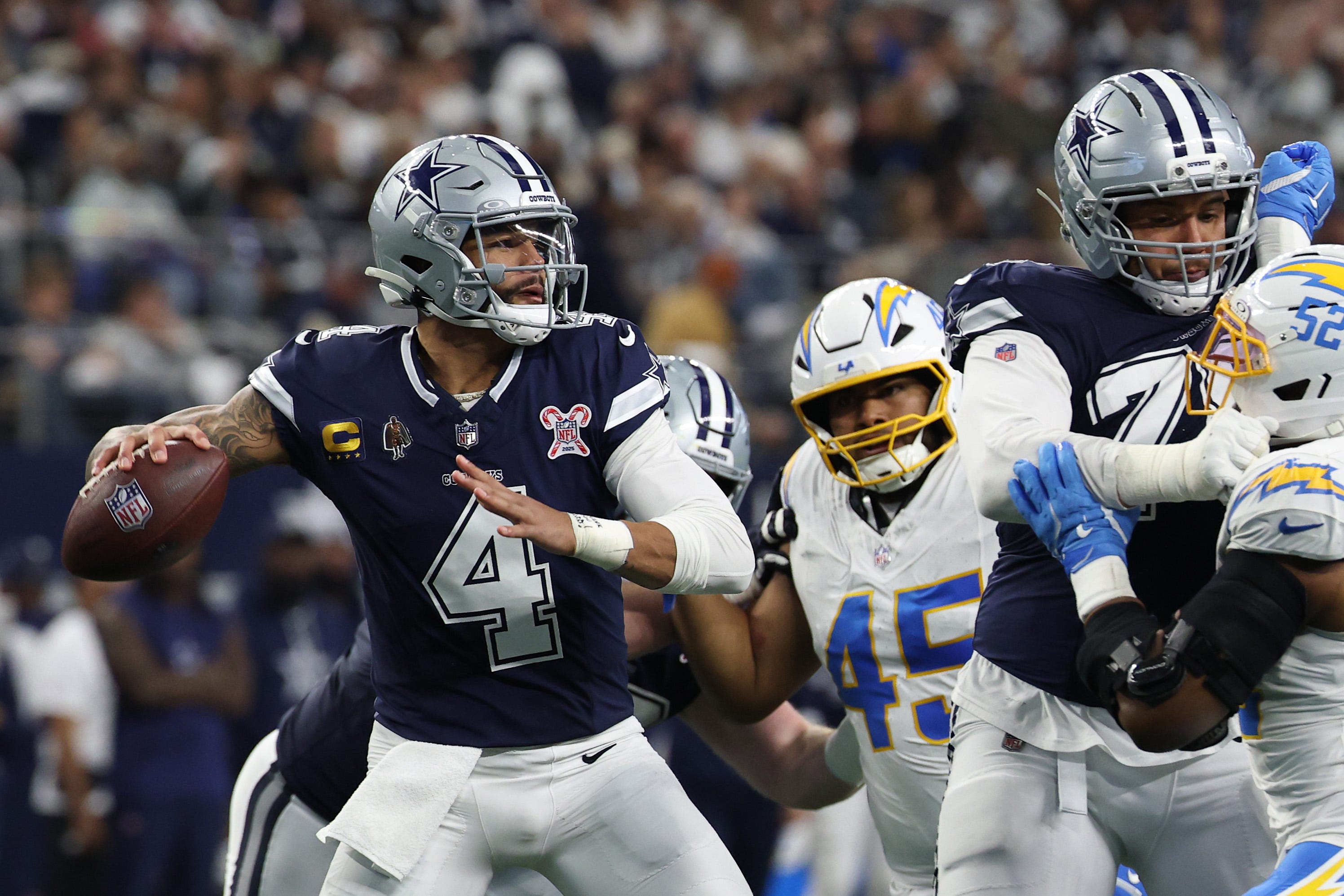 Cowboys lose final home game, fall 34-17 to Chargers