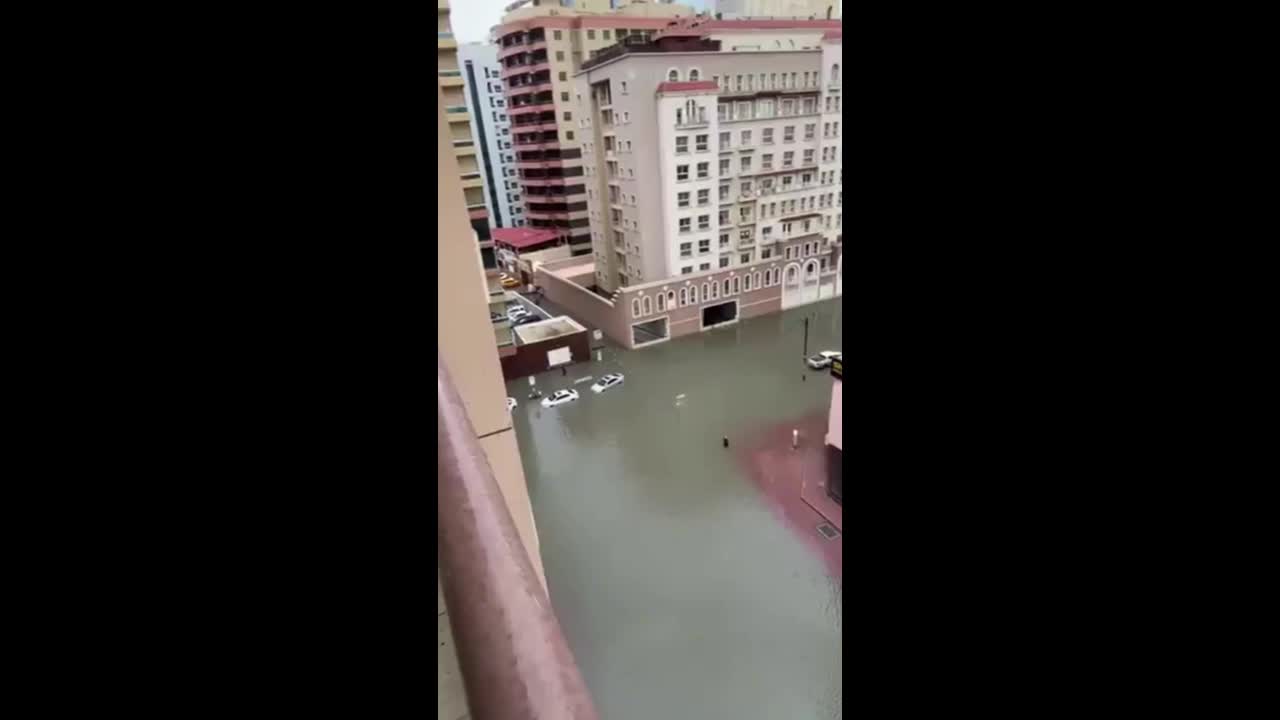 Cars submerged by flash flooding in Al Nadah, Dubai, UAE