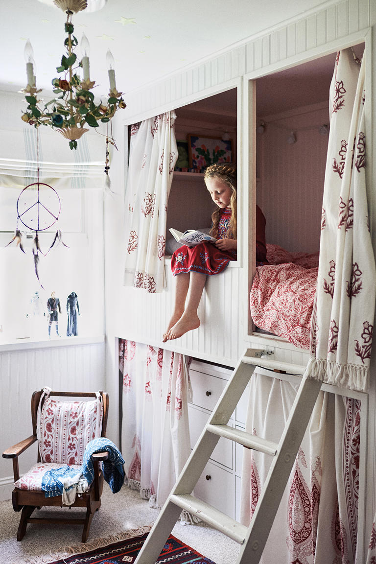 Colorful found fabrics drape nearly every surface in this fashion ...