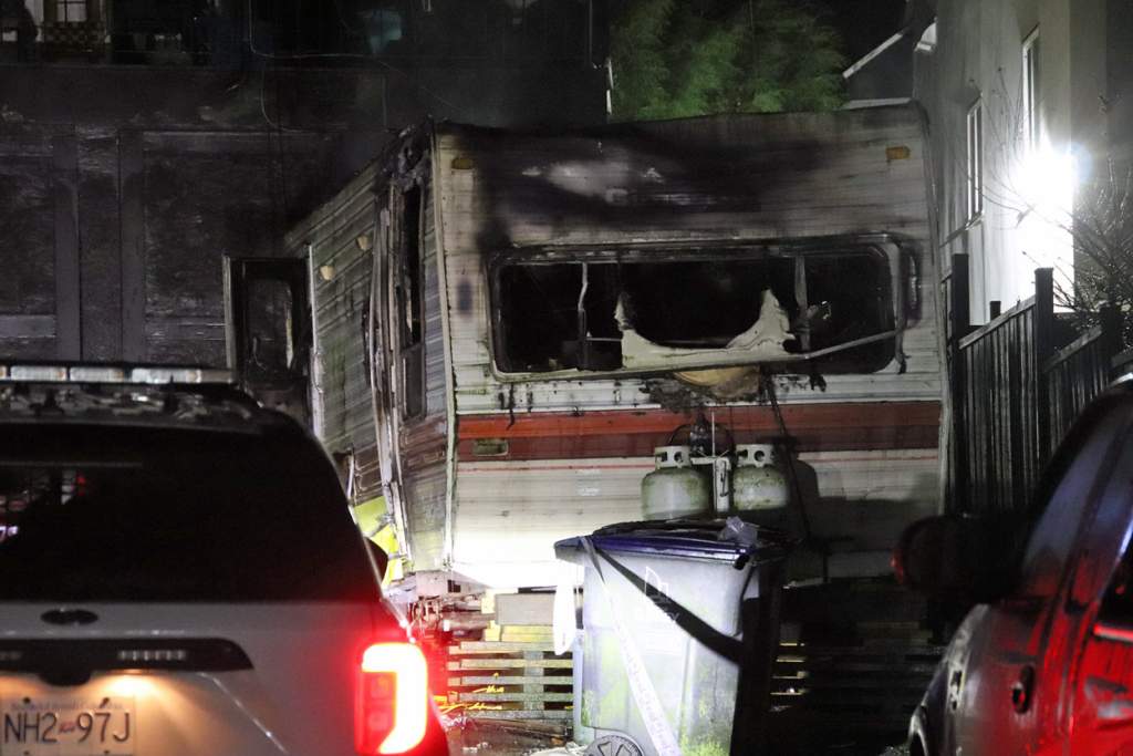 2 people found dead inside trailer that caught fire in Surrey