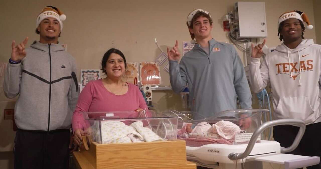 Watch: Arch Manning, Longhorn teammates bring holiday cheer to Austin ...