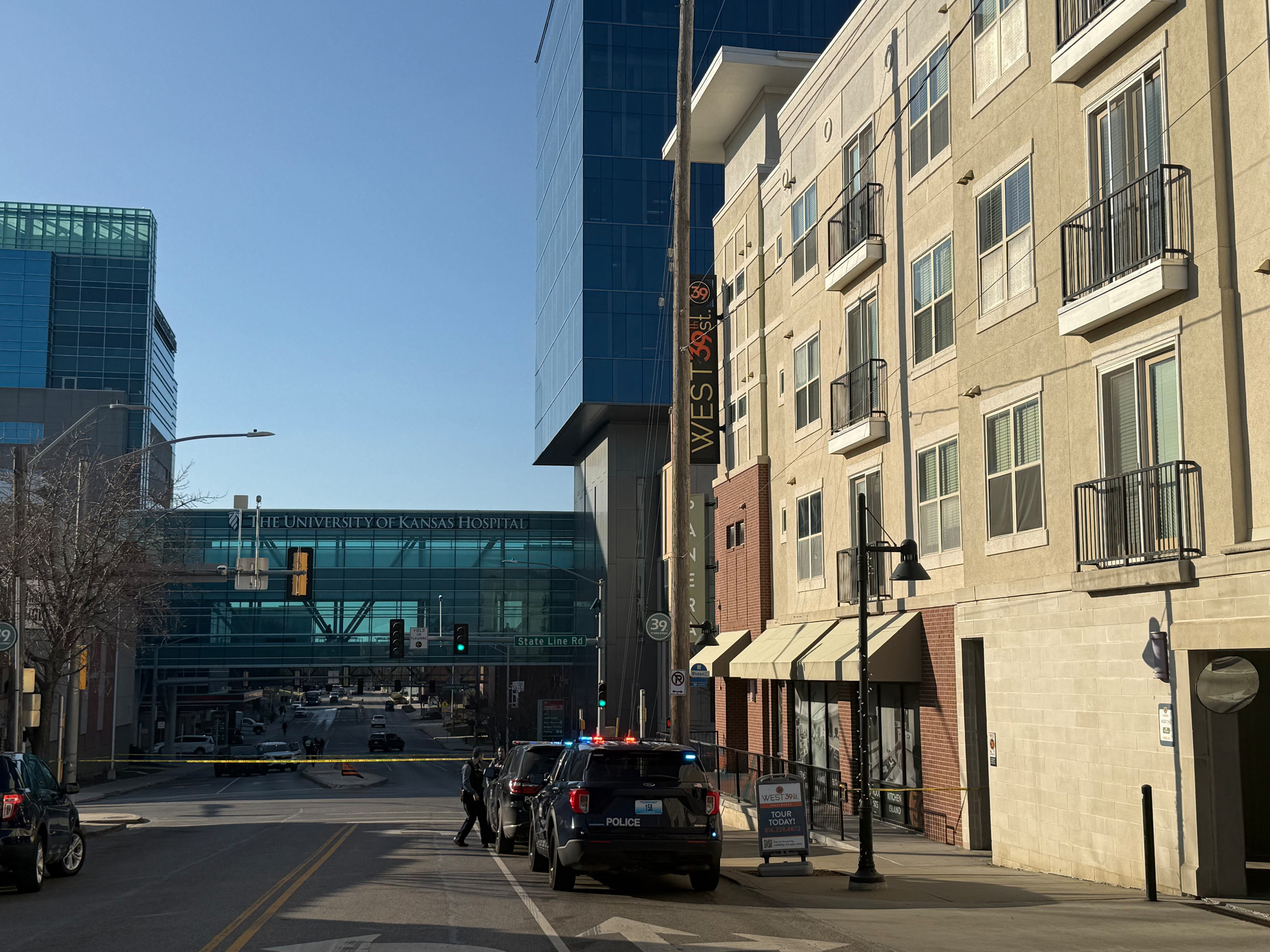 Man wounded in KCMO shooting, stray bullet hits University of Kansas ...