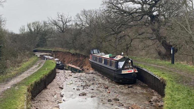 In pictures: Canal bursts to leave giant hole