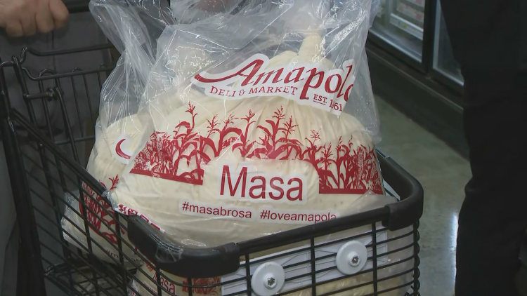 People line up outside Amapola Market in Downey for holiday tradition