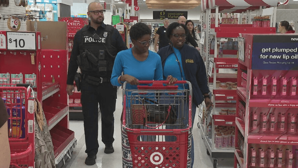 Pensacola kids shop with police in annual 'Heroes and Helpers' event at ...