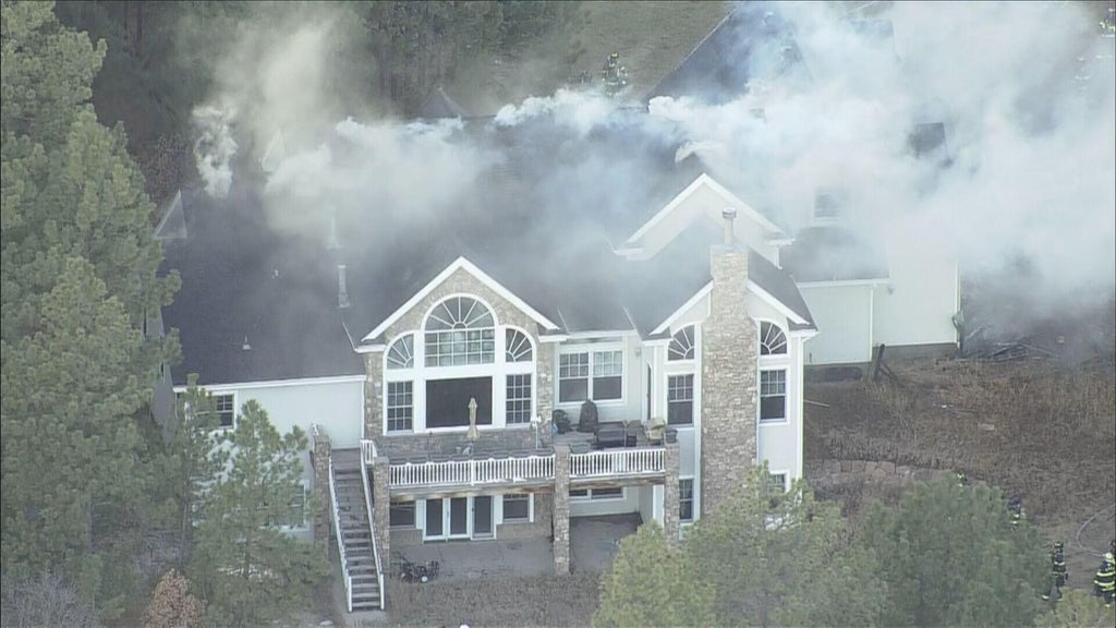 Colorado firefighters rush to put out garage fire that spread to home ...