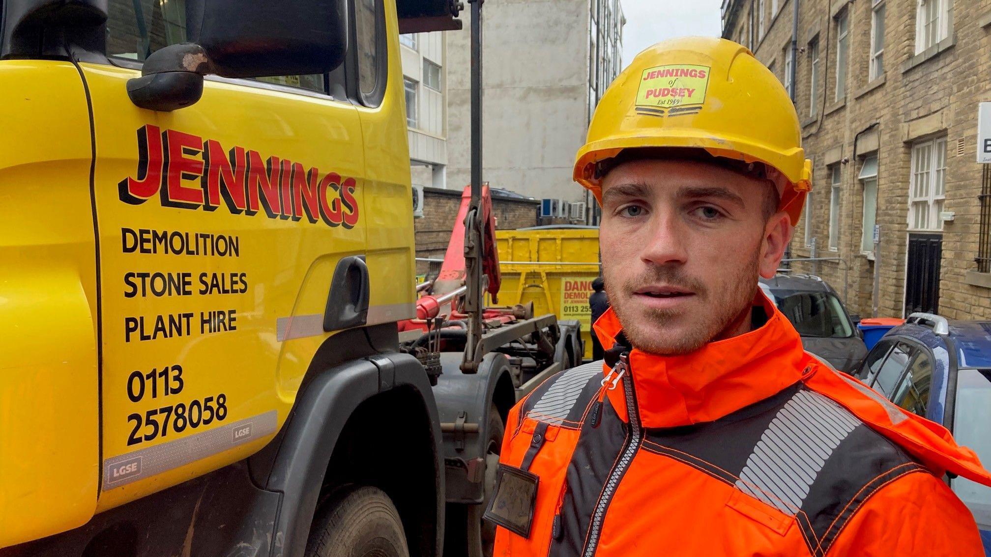 Demolition begins after partial building collapse