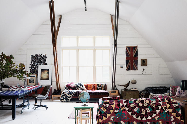 Colorful found fabrics drape nearly every surface in this fashion ...