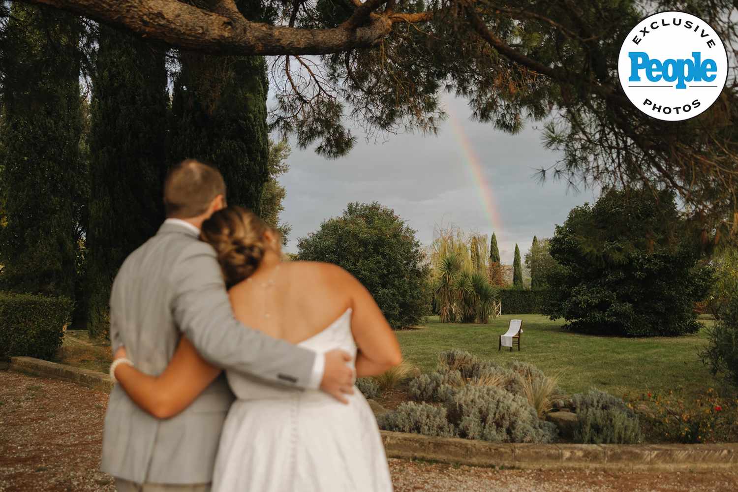 Double rainbow breaks through clouds and ends on wedding chair reserved ...