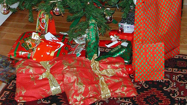 Blue Elf program delivers holiday joy to 13 families