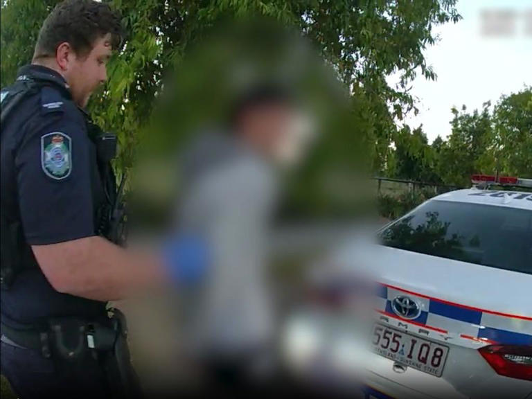 Moment teen arrested hiding in portaloo