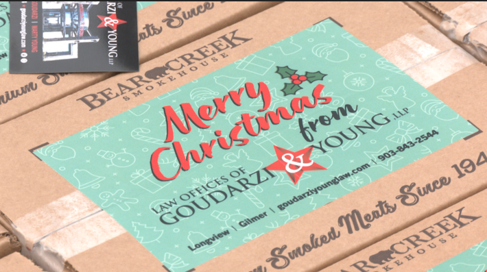 Goudarzi & Young hosts ham giveaway in Longview and Gilmer