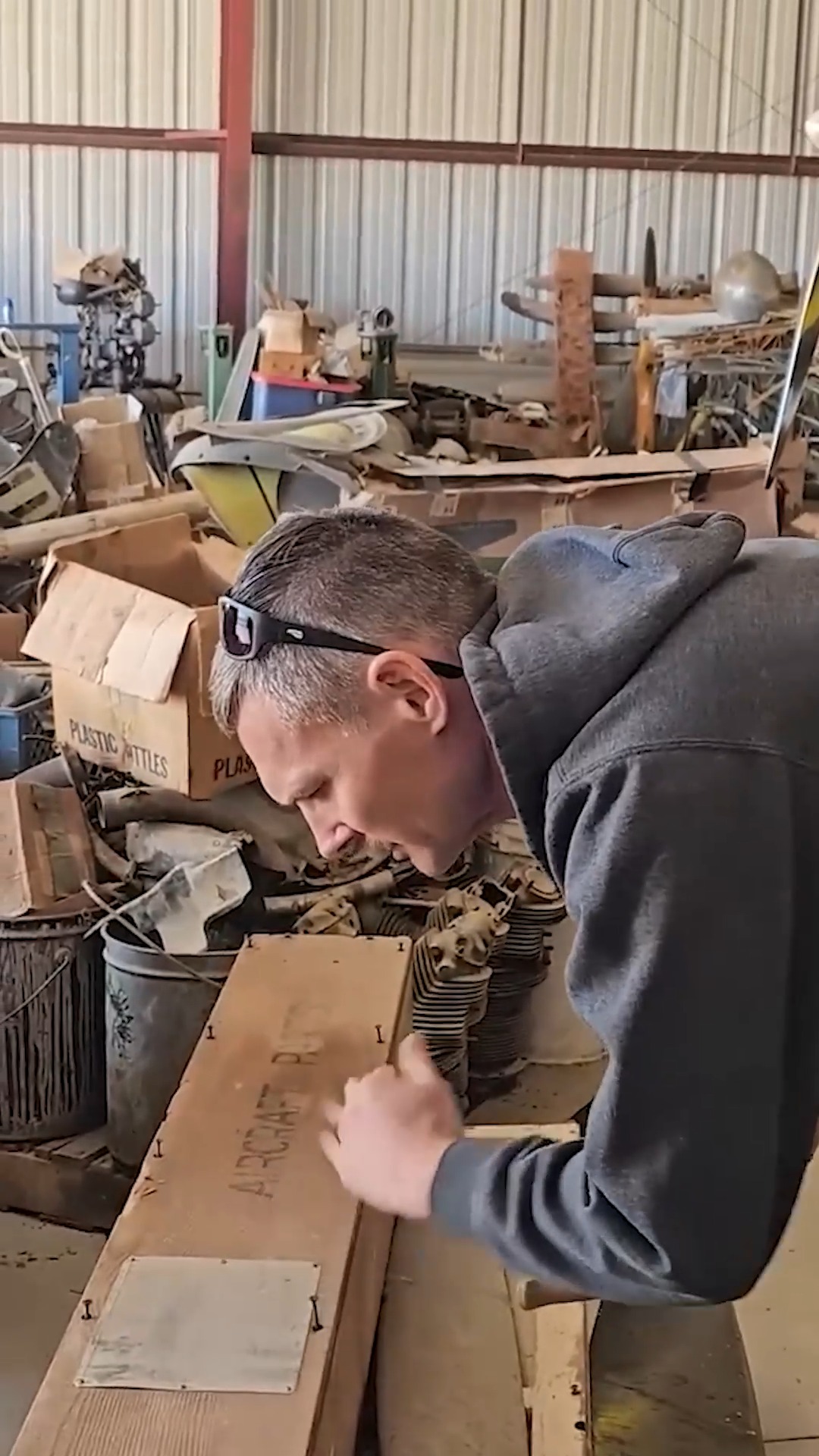 Inside a barn filled with historic aircraft parts