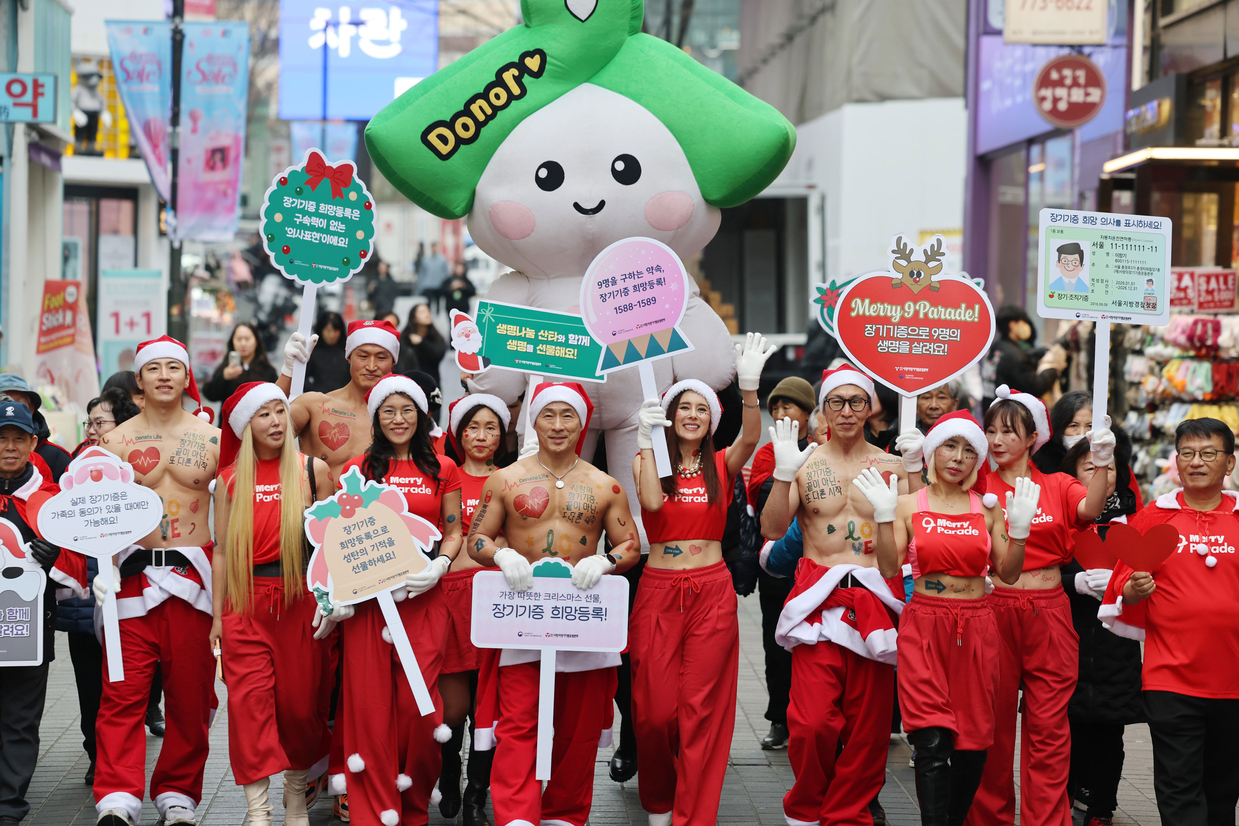 Muscular Santas march for organ donation awareness
