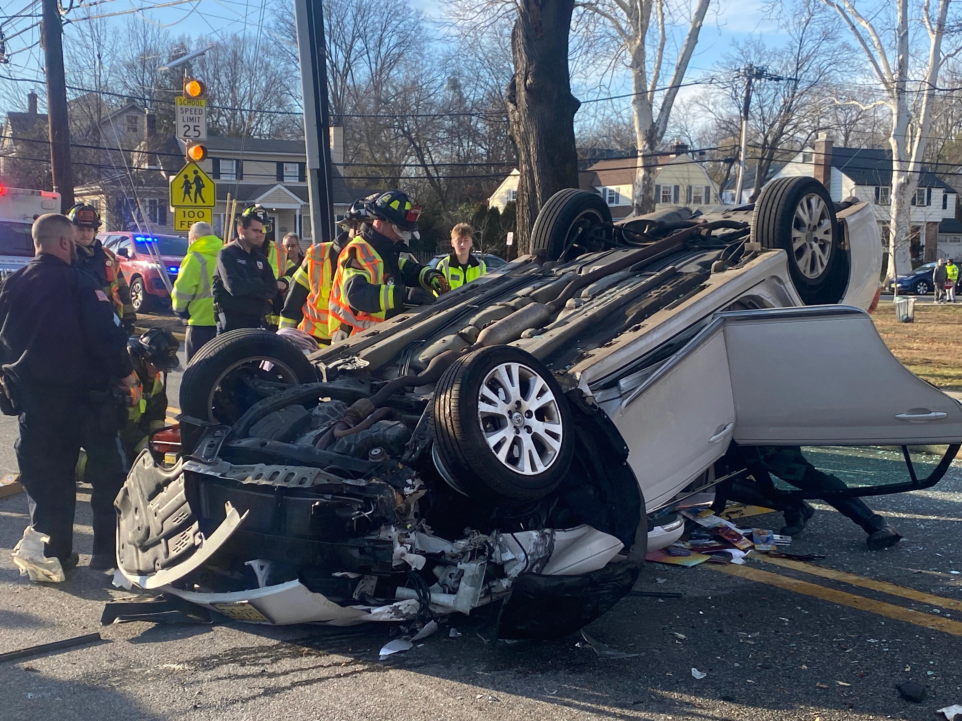 Driver hospitalized after car crashes, flips on Glen Rock road
