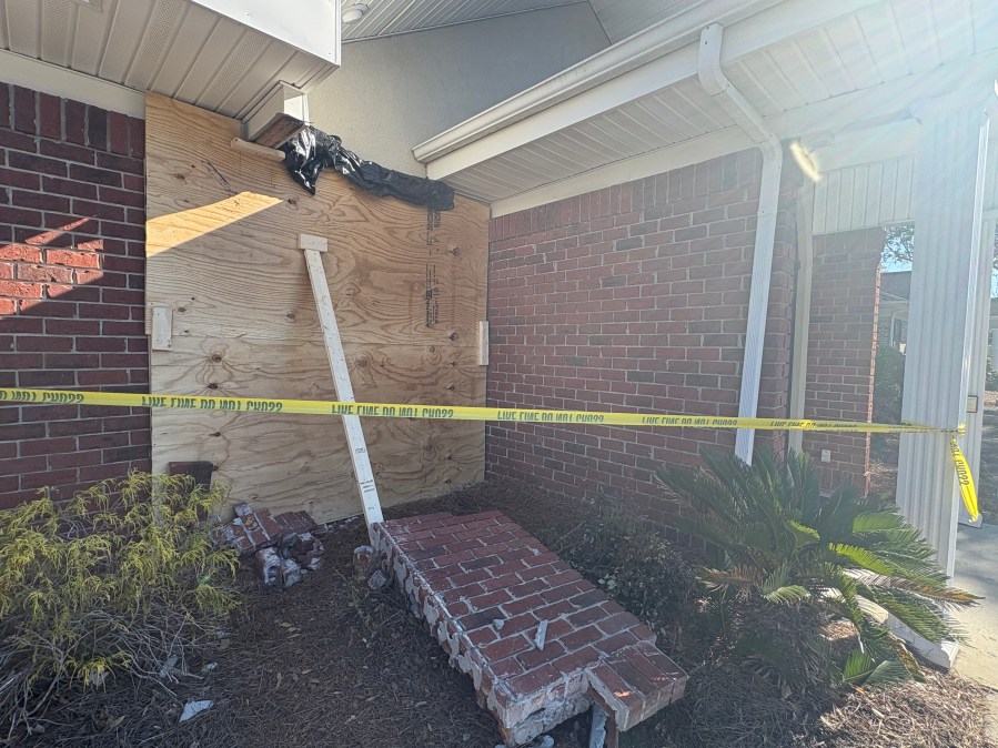 Photos: Car crashes into downtown Conway eye clinic