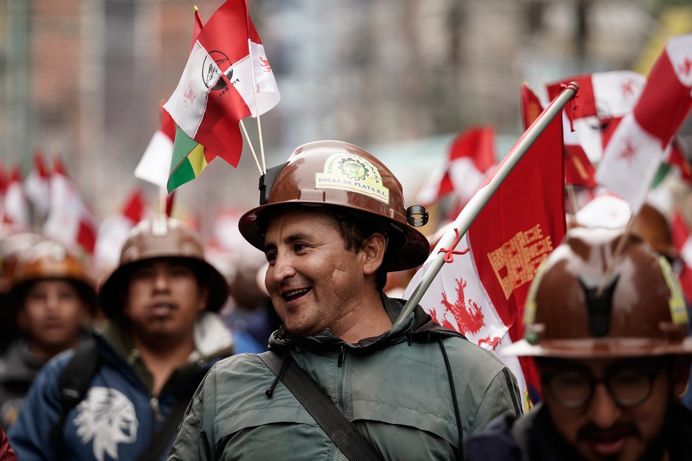 Workers organized by a key union rally in Bolivia against scrapping ...