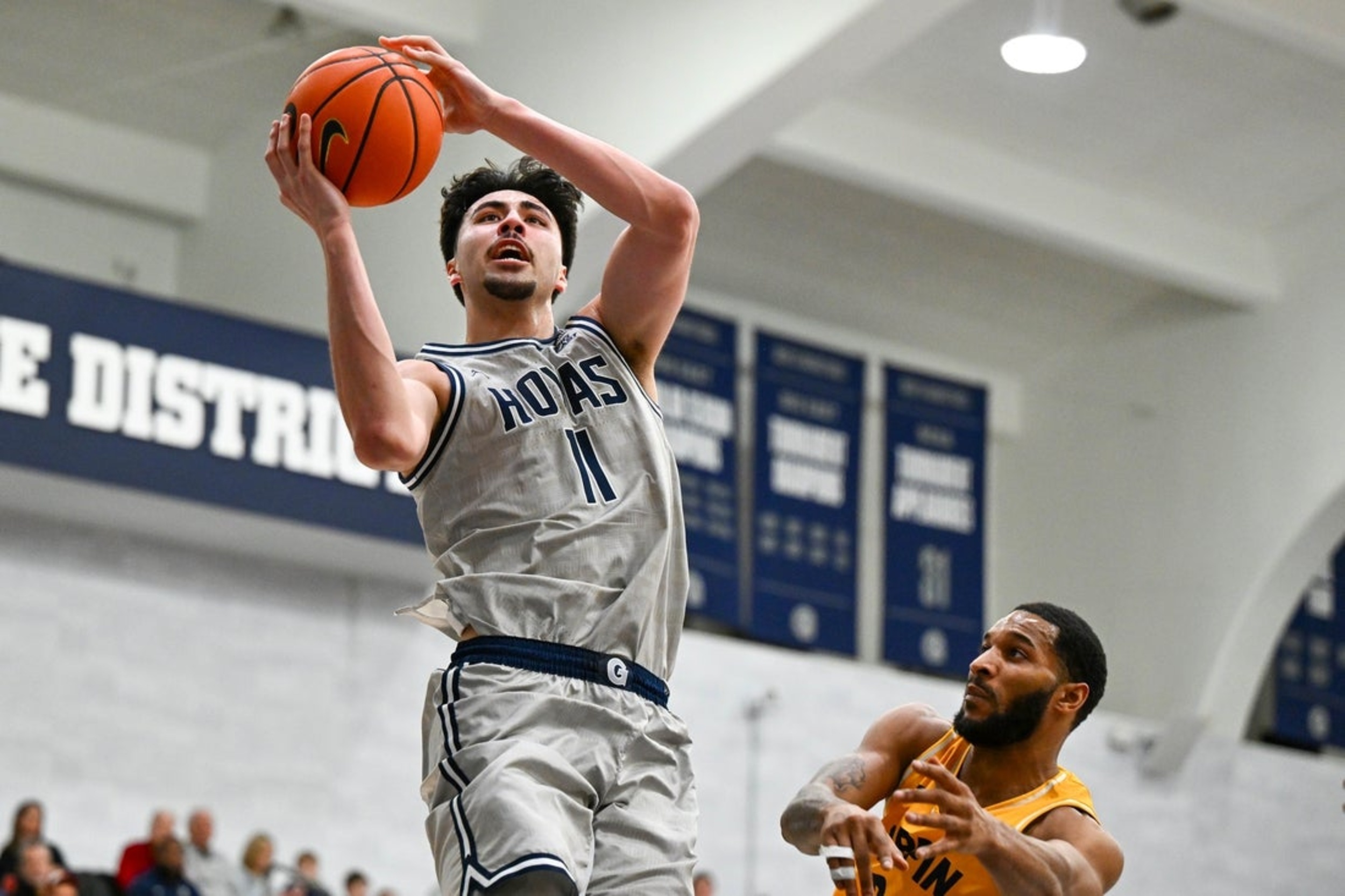 Georgetown gets hot from distance, outdistances Coppin State