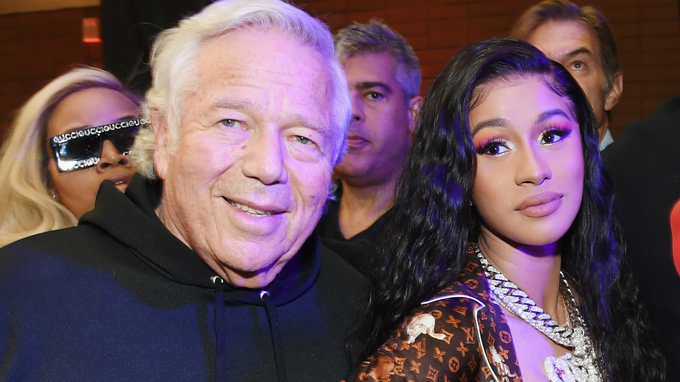 Watch Cardi B talk trash at Patriots game with Robert Kraft in tow