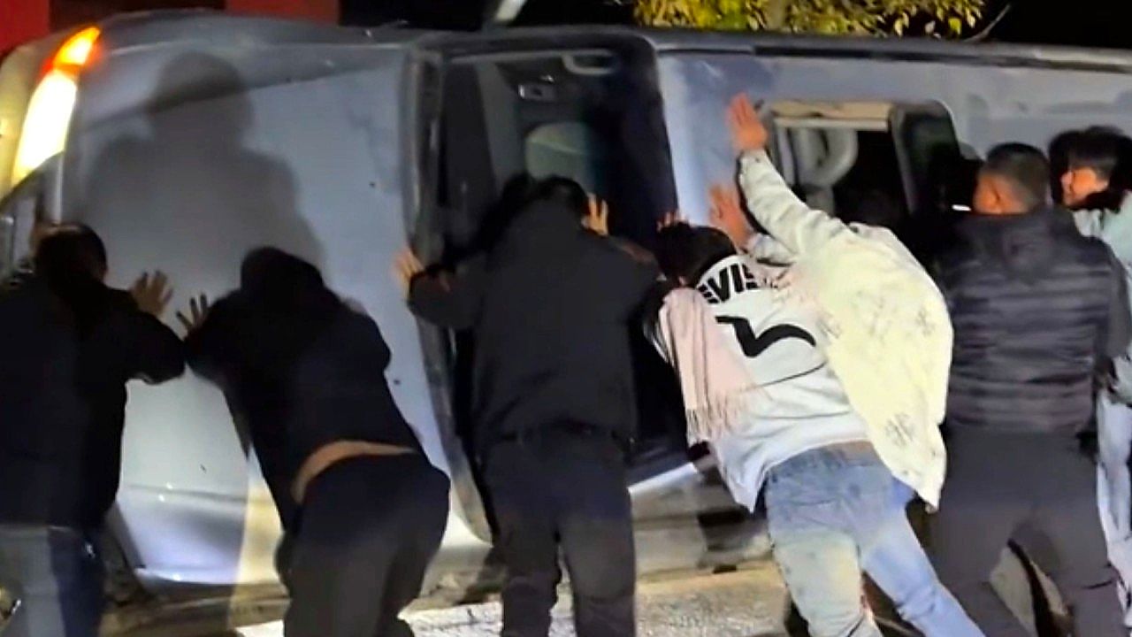 Strangers rush in when a roadside mishap takes a sudden turn