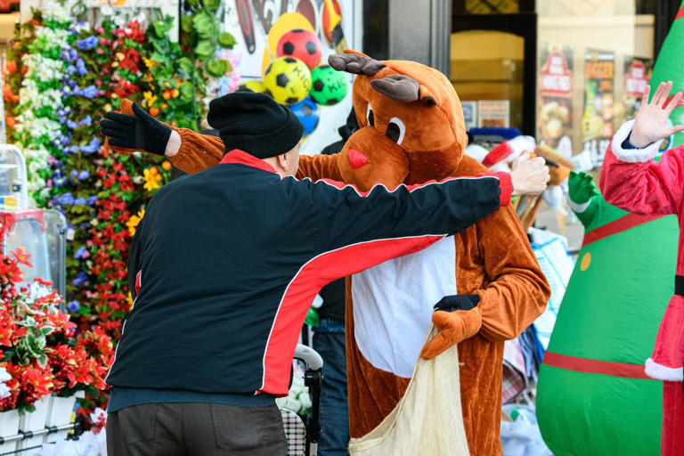 13 festive pics as Santa, Rudolph, a snowman, and a Christmas tree give ...