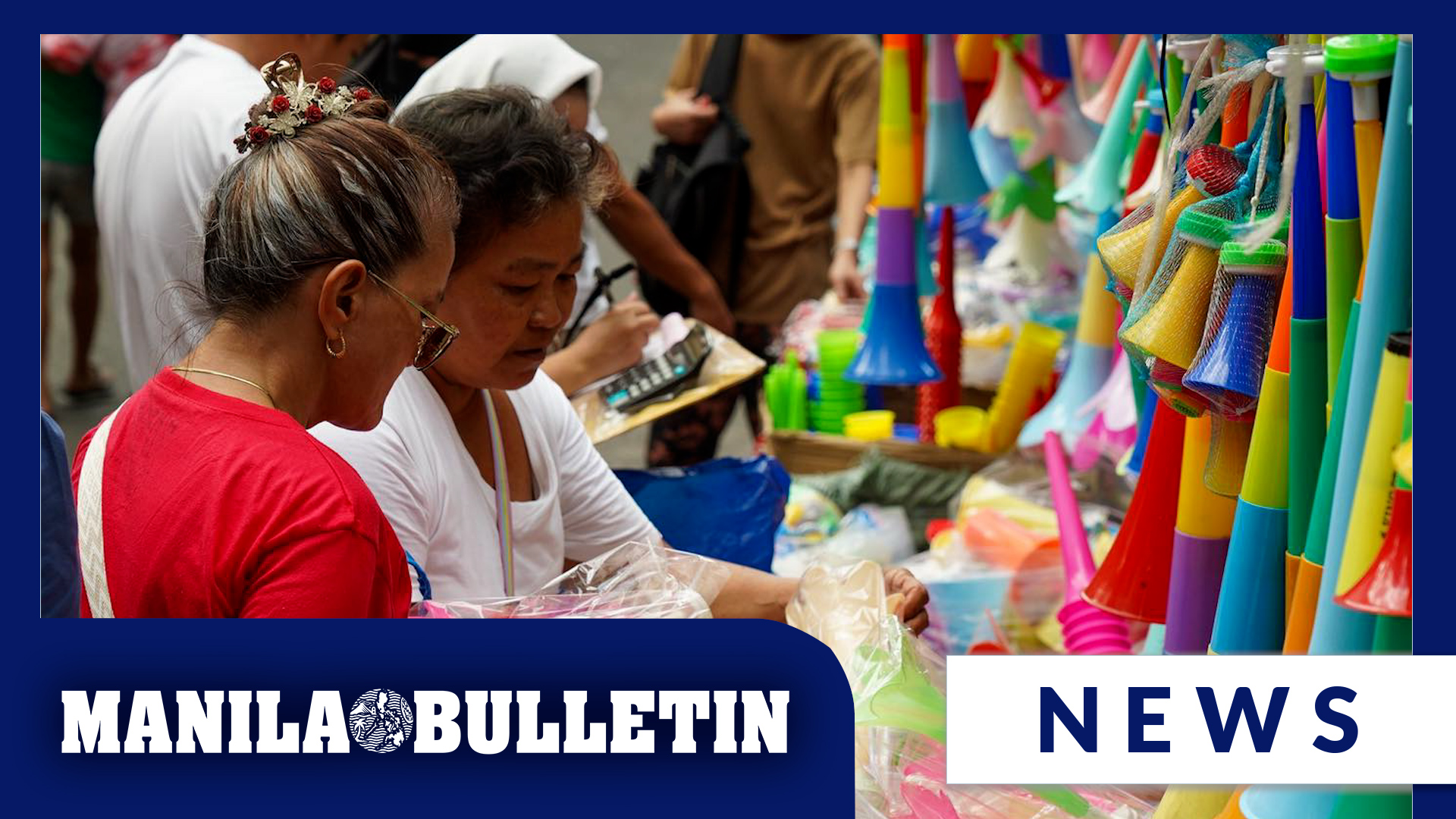Vendor tends to customers buying torotot at Divisoria