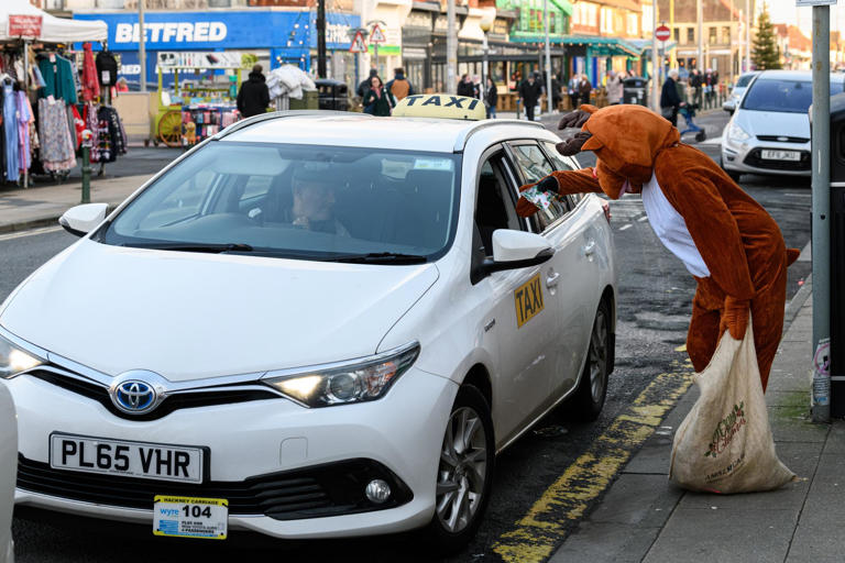 13 festive pics as Santa, Rudolph, a snowman, and a Christmas tree give ...