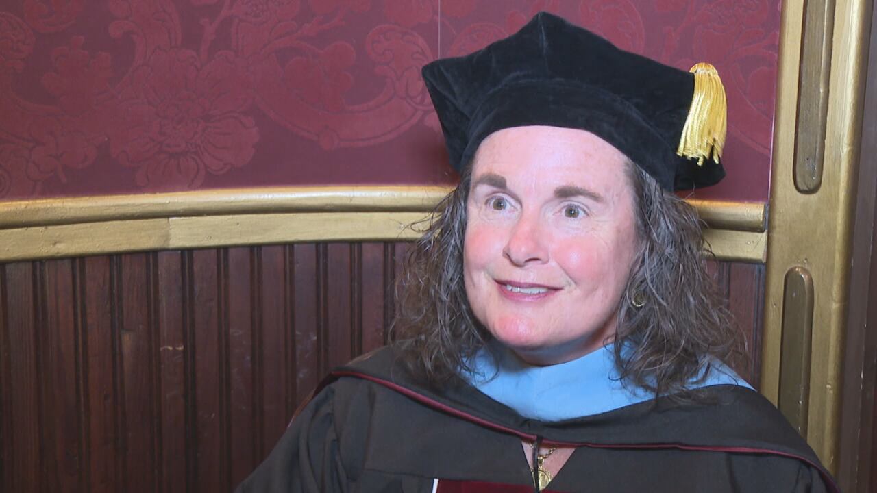 Woman completes doctorate nearly three decades after quitting to focus ...