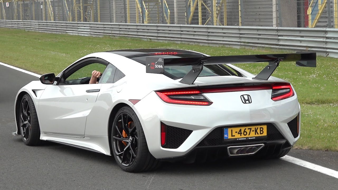 Honda NSX accelerating smoothly on the race track