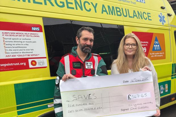 Cheque presented in memory of former mayor