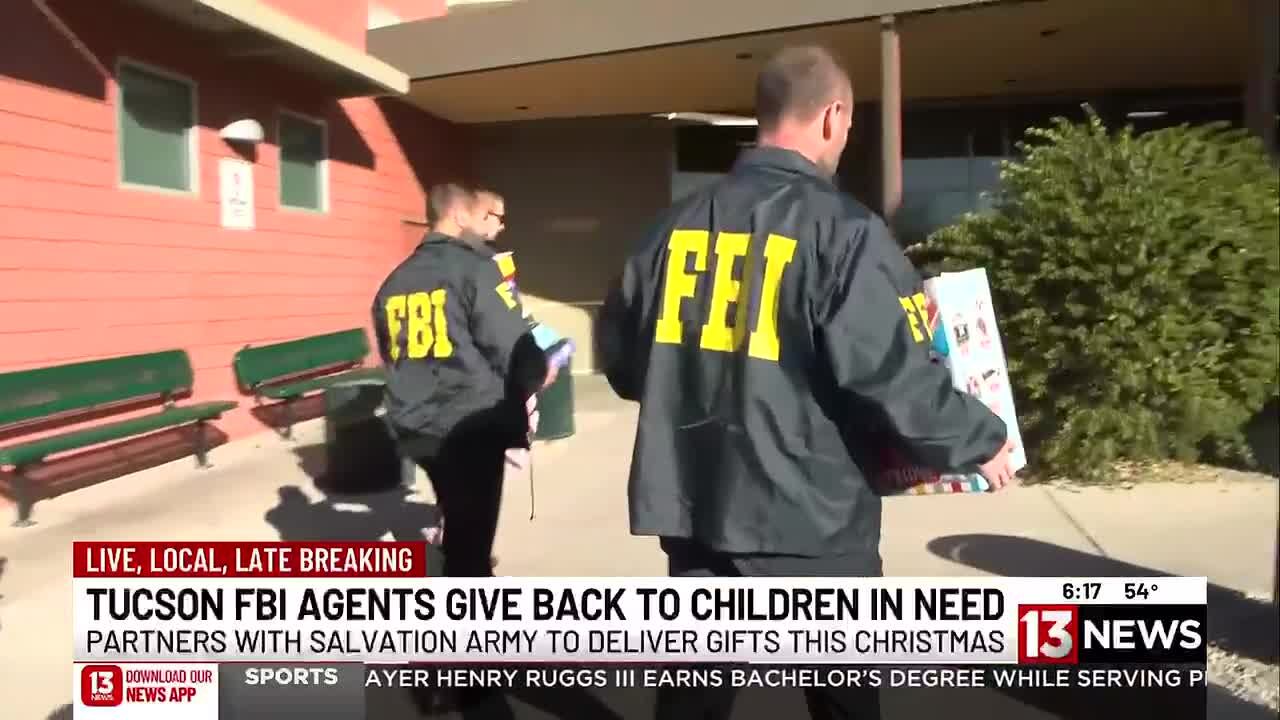FBI agents deliver Christmas gifts to Tucson families in need