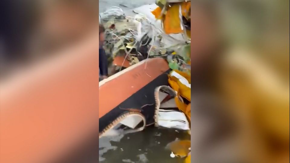 Bystander rescues woman trapped in plane crash